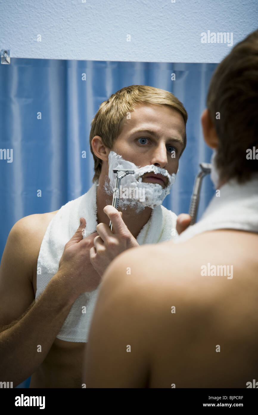 Male grooming himself Stock Photo - Alamy