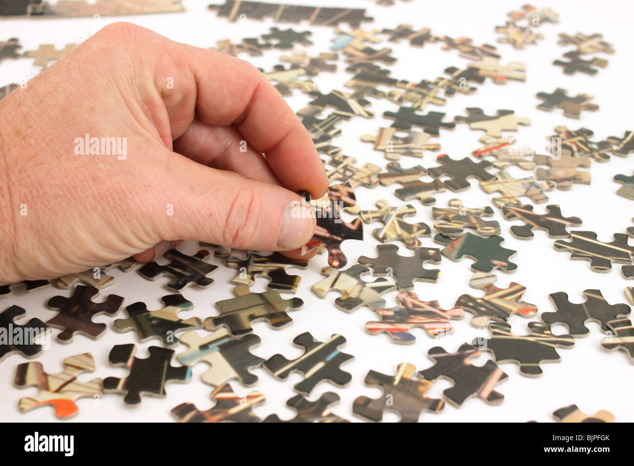 Scattered puzzle pieces hi-res stock photography and images - Alamy