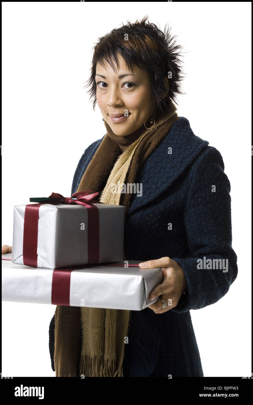Woman giving presents out hi-res stock photography and images - Alamy