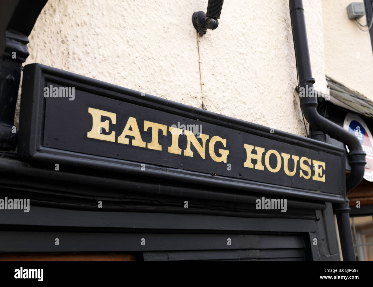 Pub sign eating house Stock Photo - Alamy