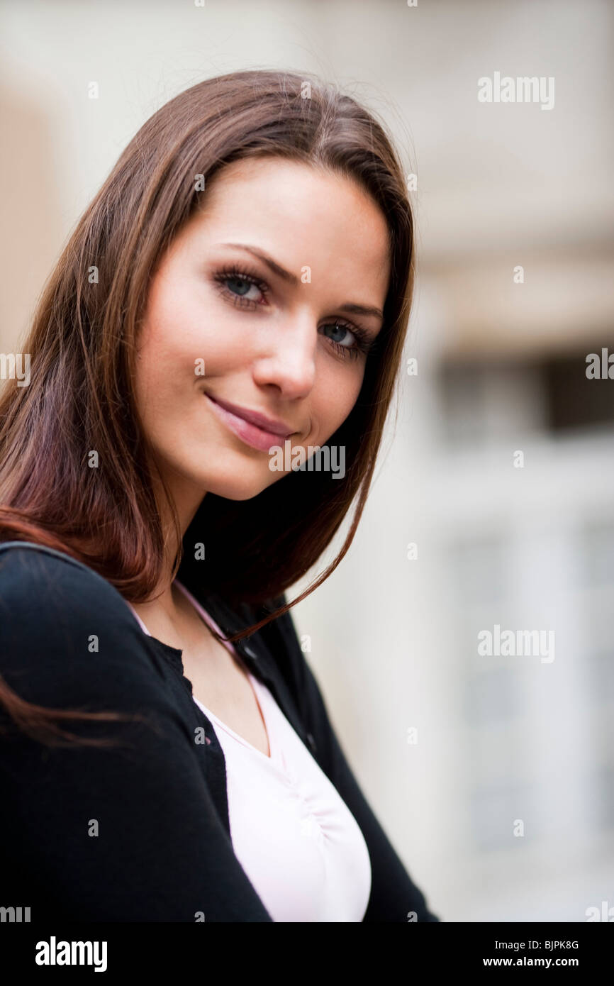 Woman posing and smiling Stock Photo - Alamy