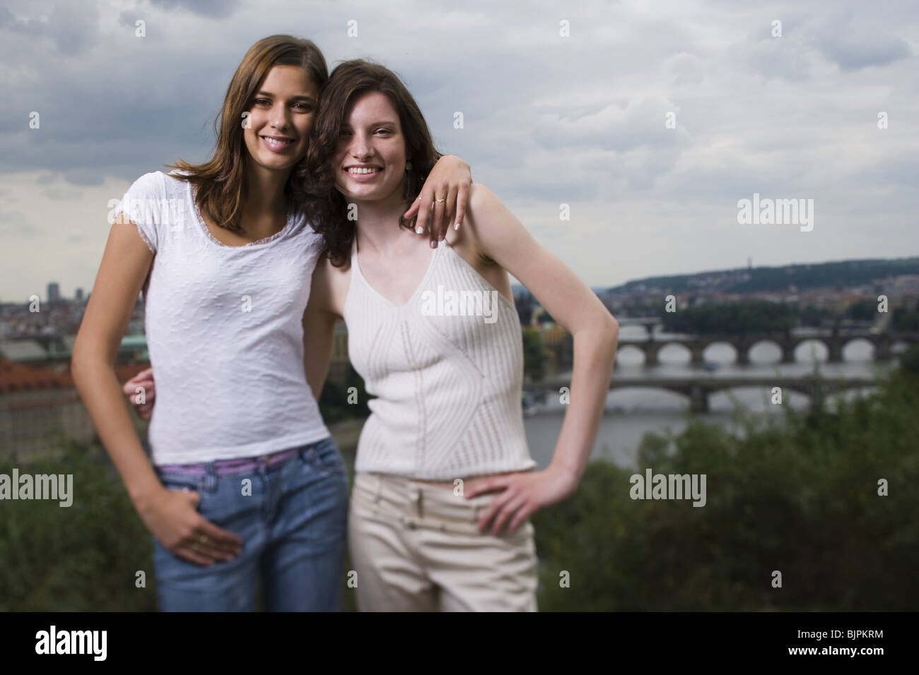 Two women with scenic background Stock Photo - Alamy