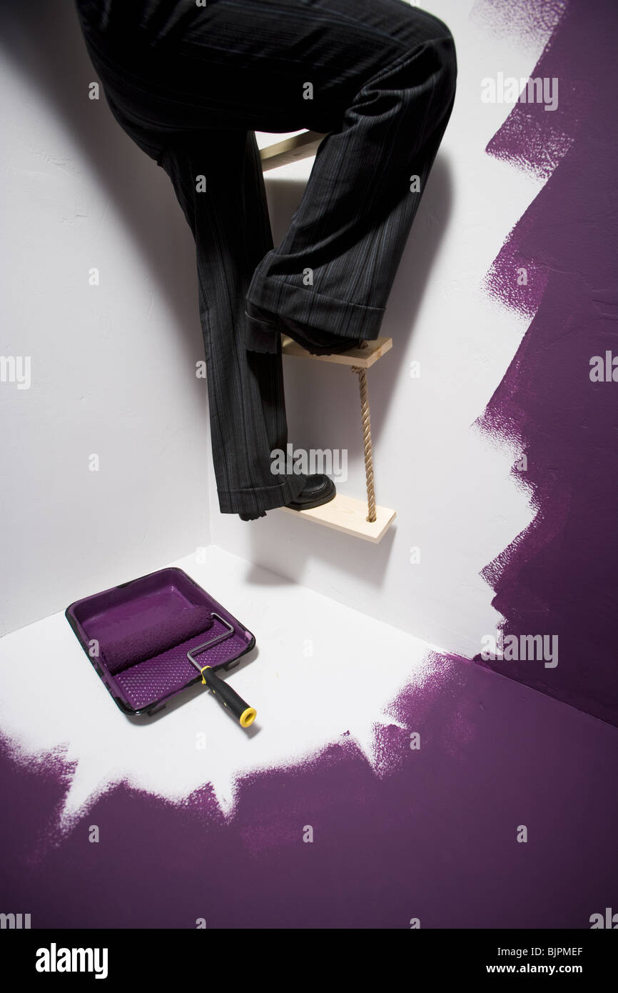 Woman climbing a ladder Stock Photo - Alamy