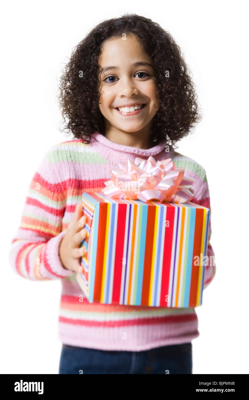 Girl posing with gift box Stock Photo - Alamy