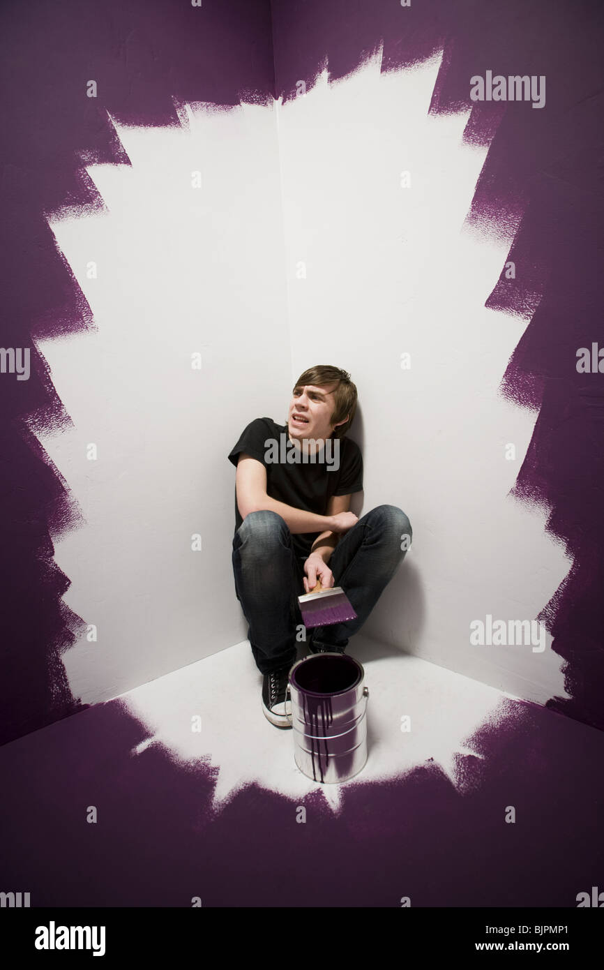 Crouching down sad hi-res stock photography and images - Alamy