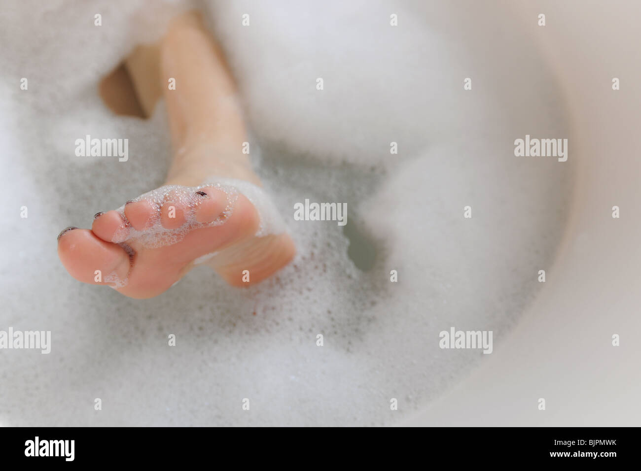 foot in bubble bath Stock Photo - Alamy