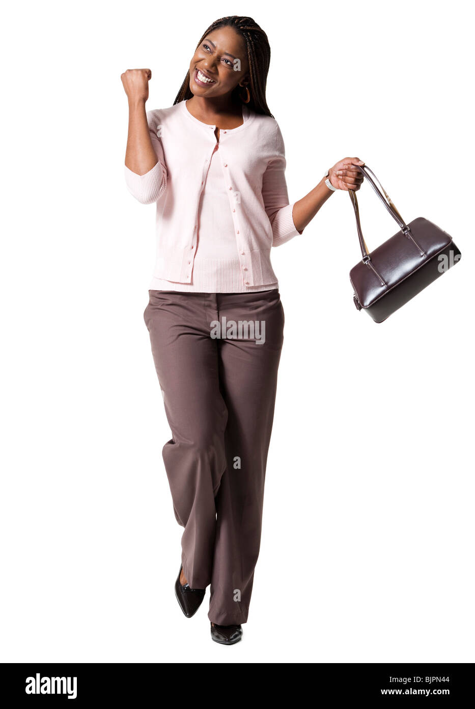 Excited woman walking Stock Photo - Alamy