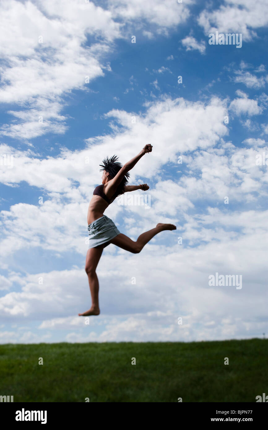 Person leaping in the air Stock Photo - Alamy