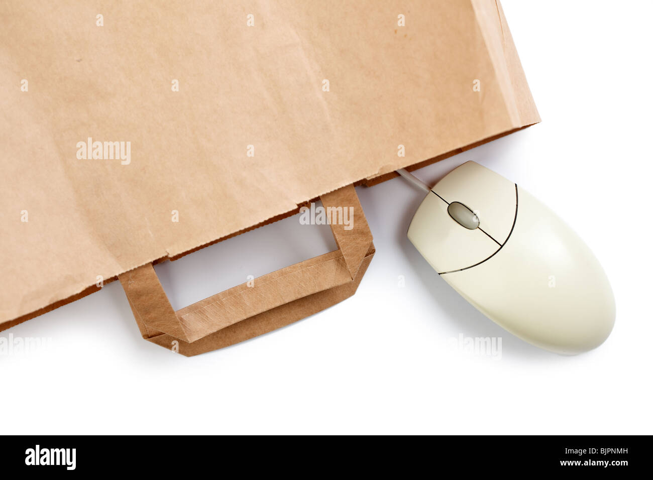 computer mouse and shopping bag on white background Stock Photo - Alamy
