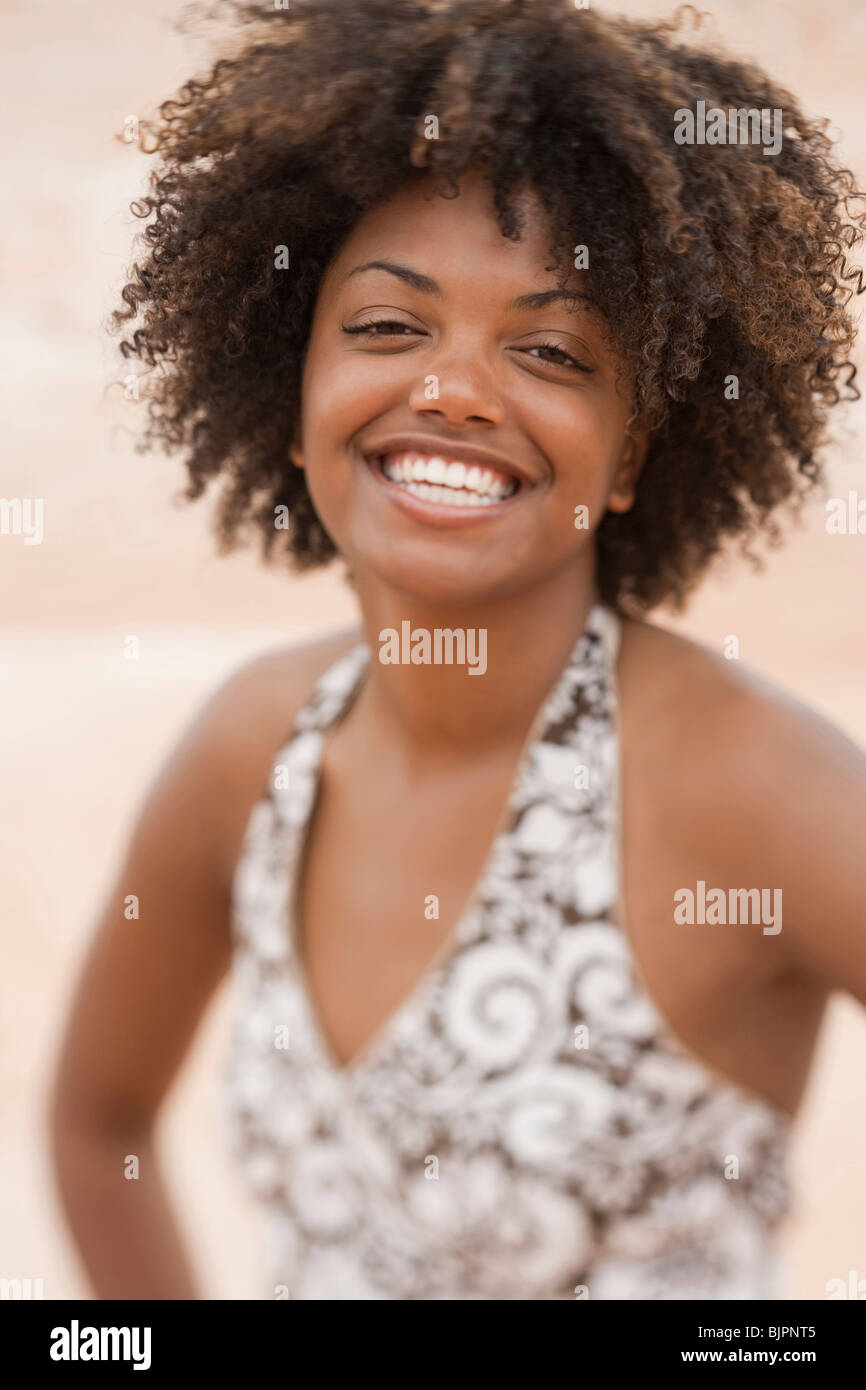 Woman posing with smile Stock Photo - Alamy