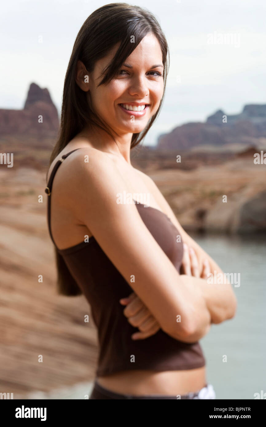 Woman posing and smiling Stock Photo - Alamy