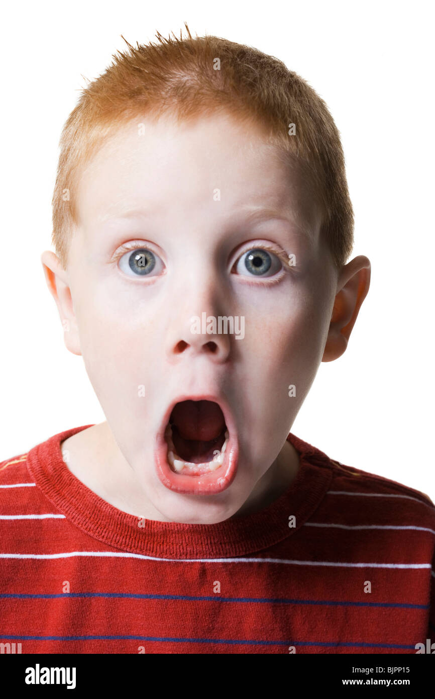 Boy posing with surprised look Stock Photo - Alamy