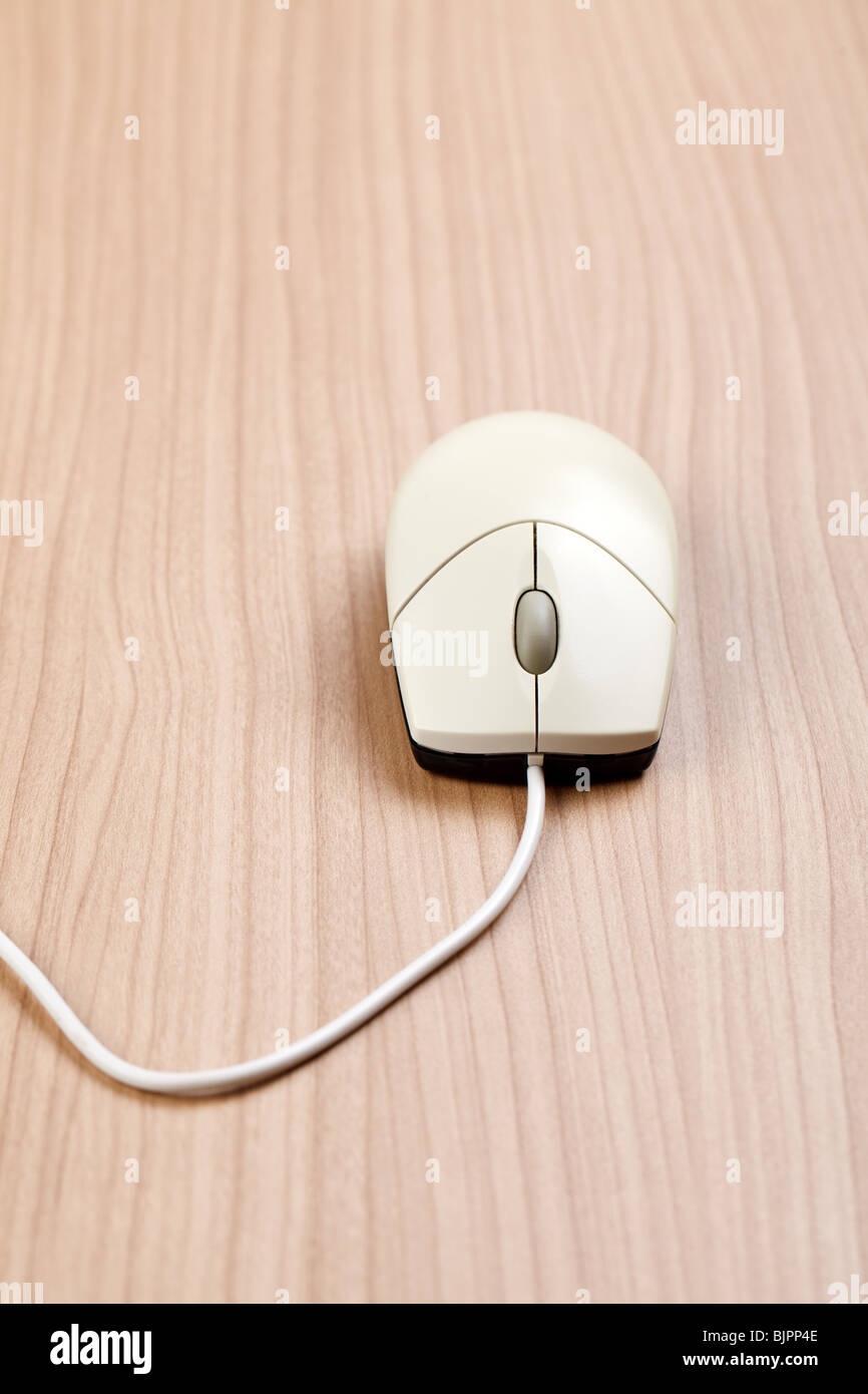 the comuter mouse on a table Stock Photo - Alamy