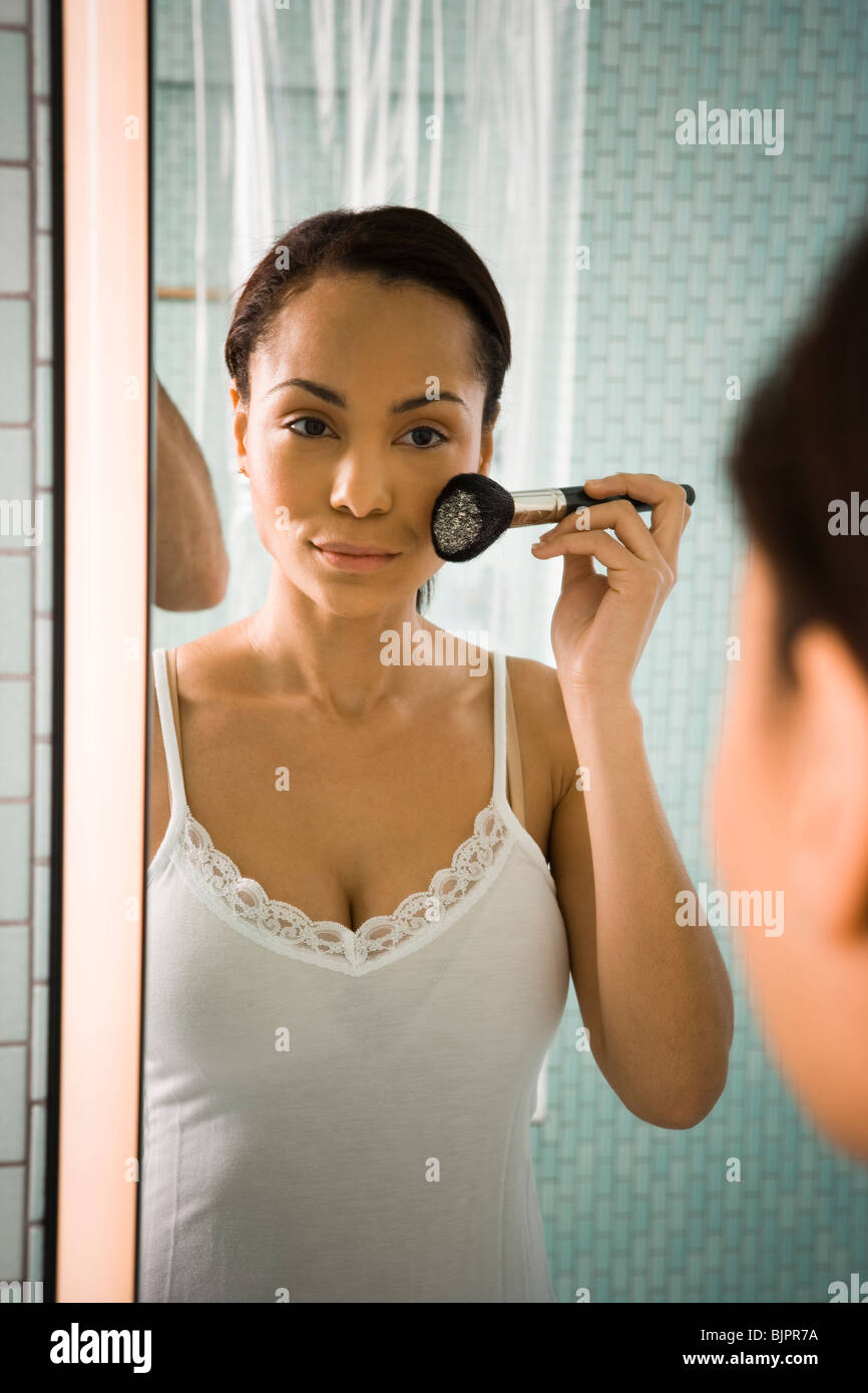 Female grooming herself Stock Photo - Alamy