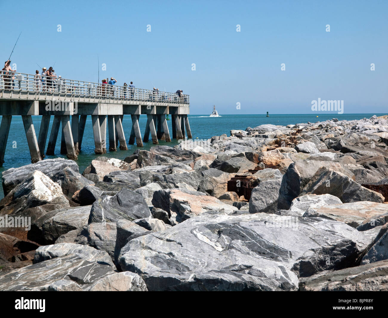 Fishing on the tan jetty hi-res stock photography and images - Alamy