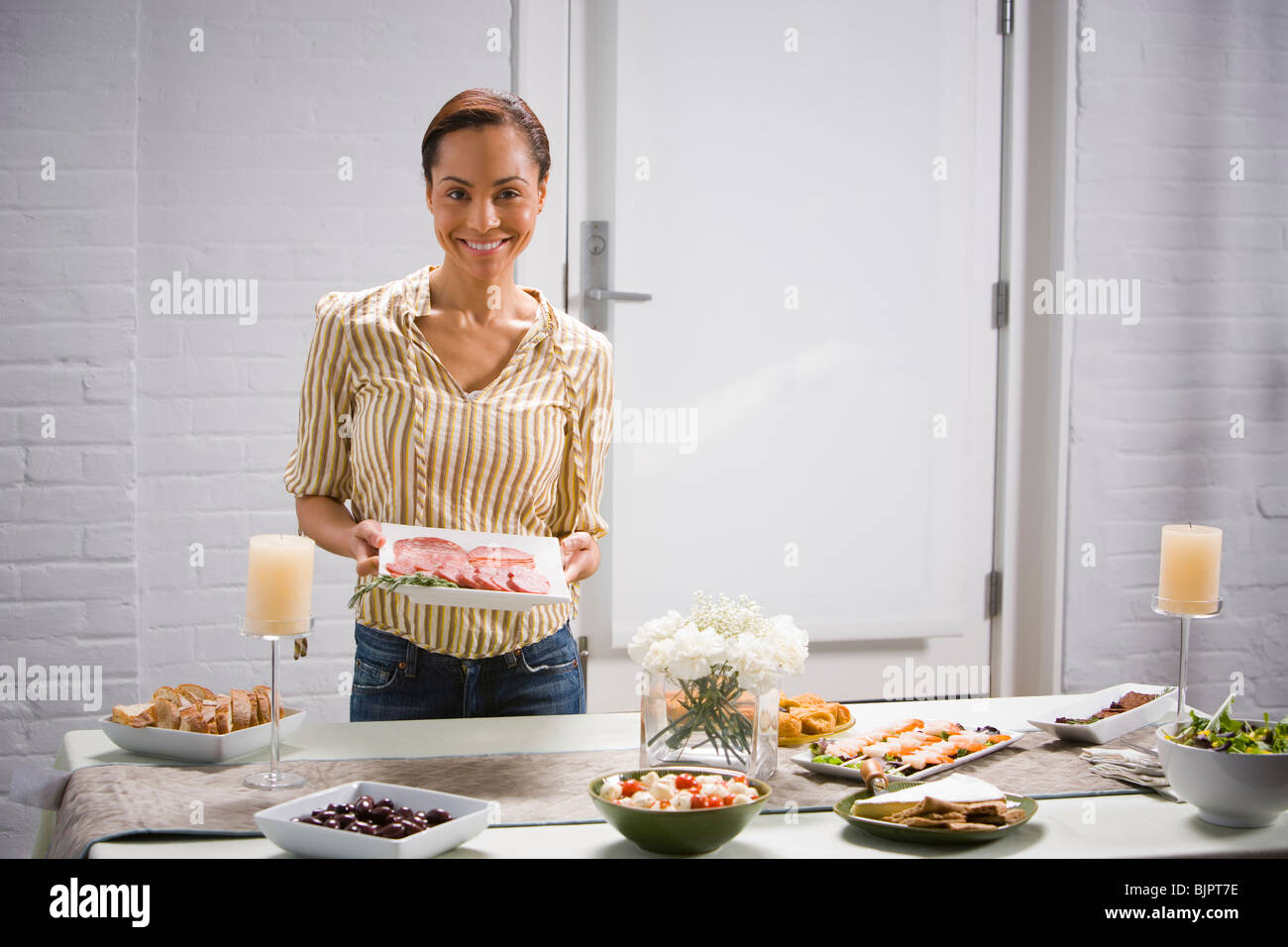 A woman preparing a party Stock Photo - Alamy