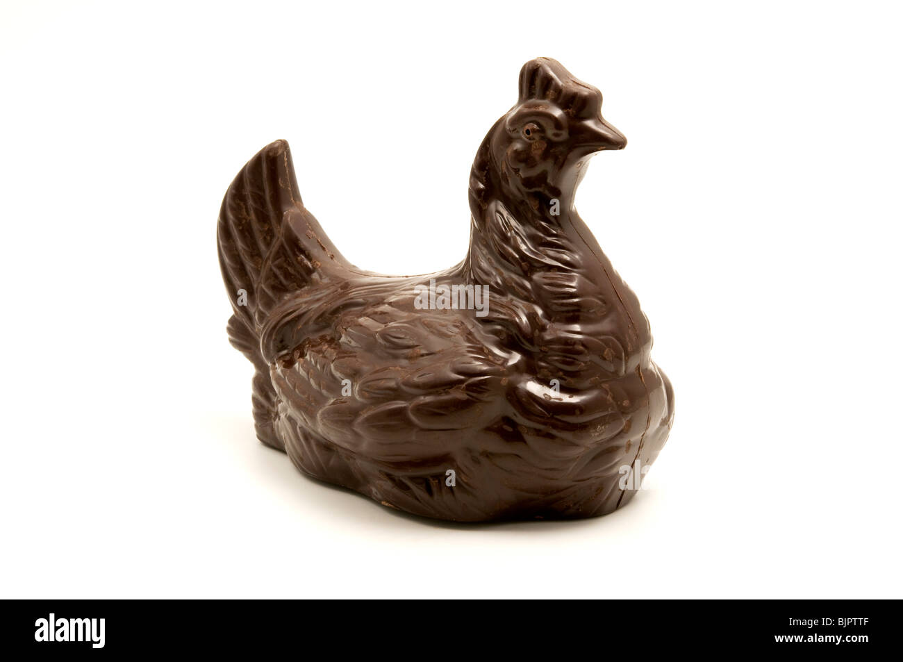 Chocolate hen on a white background Stock Photo - Alamy