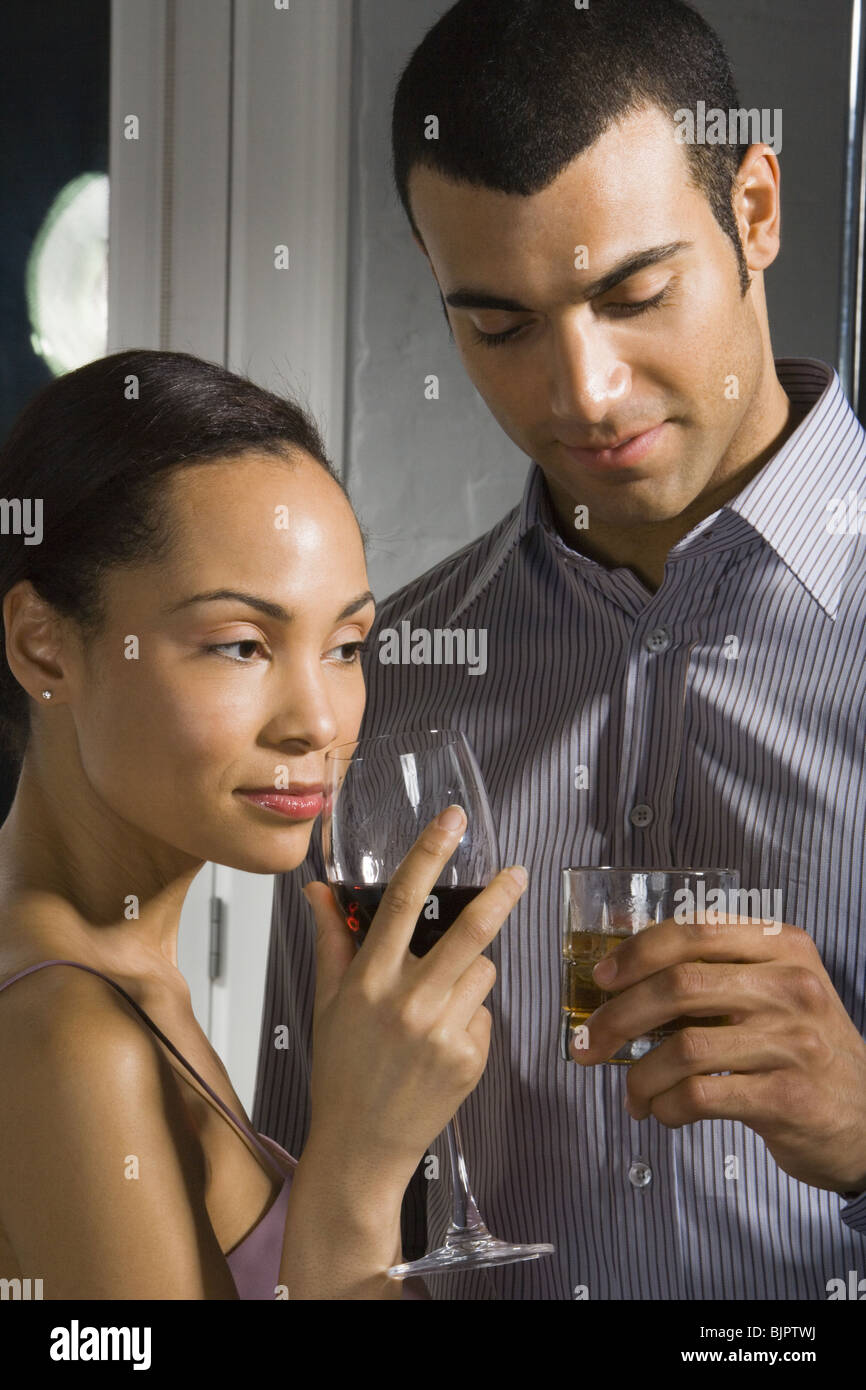 A couple at a party Stock Photo - Alamy