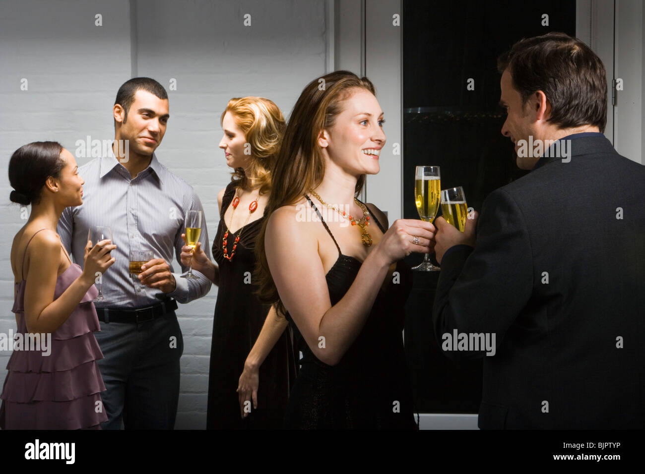 Cocktail Party Guests High Resolution Stock Photography and Images - Alamy