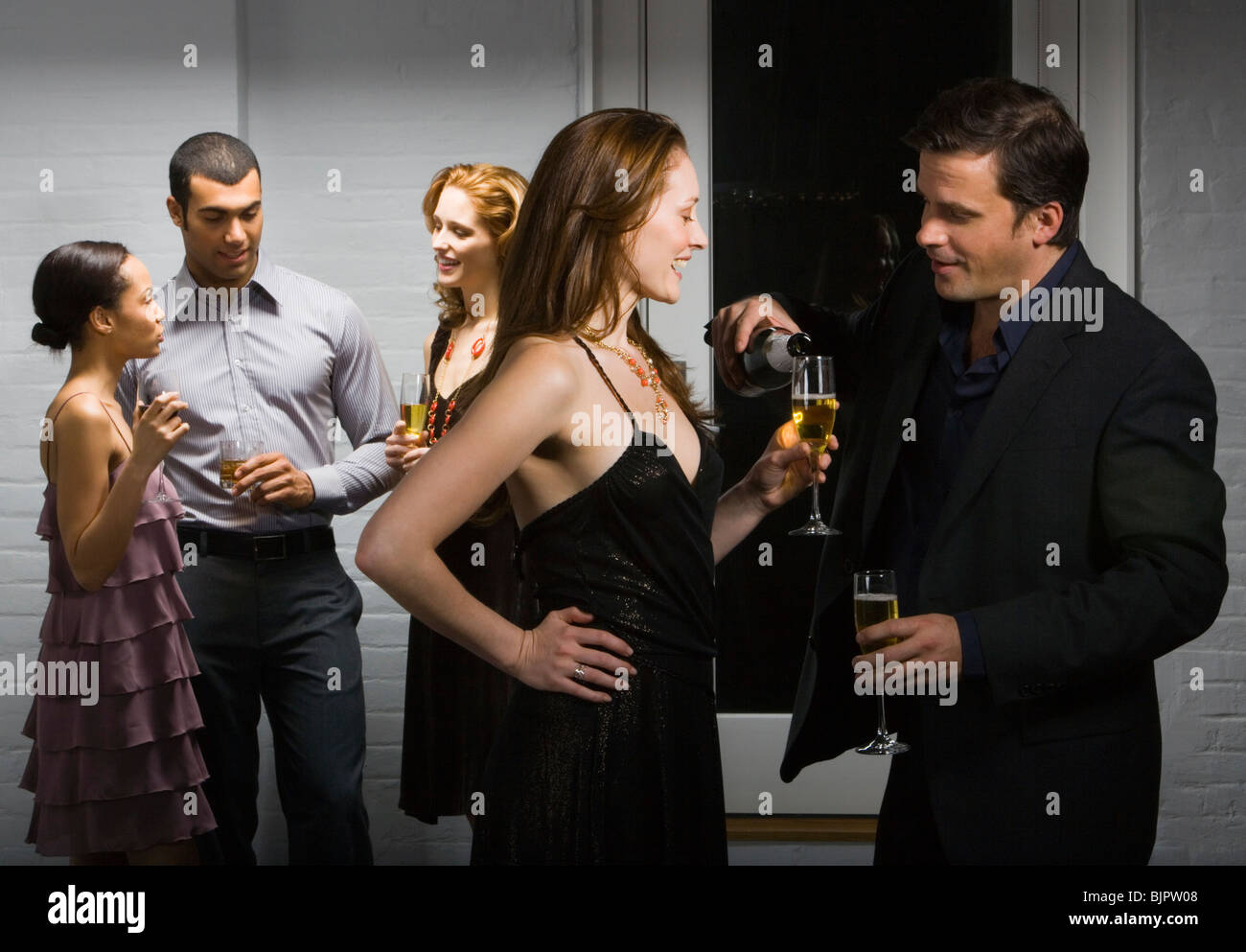 Cocktail Party Guests High Resolution Stock Photography and Images - Alamy