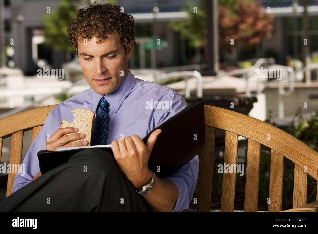 Lunch on park bench hi-res stock photography and images - Alamy
