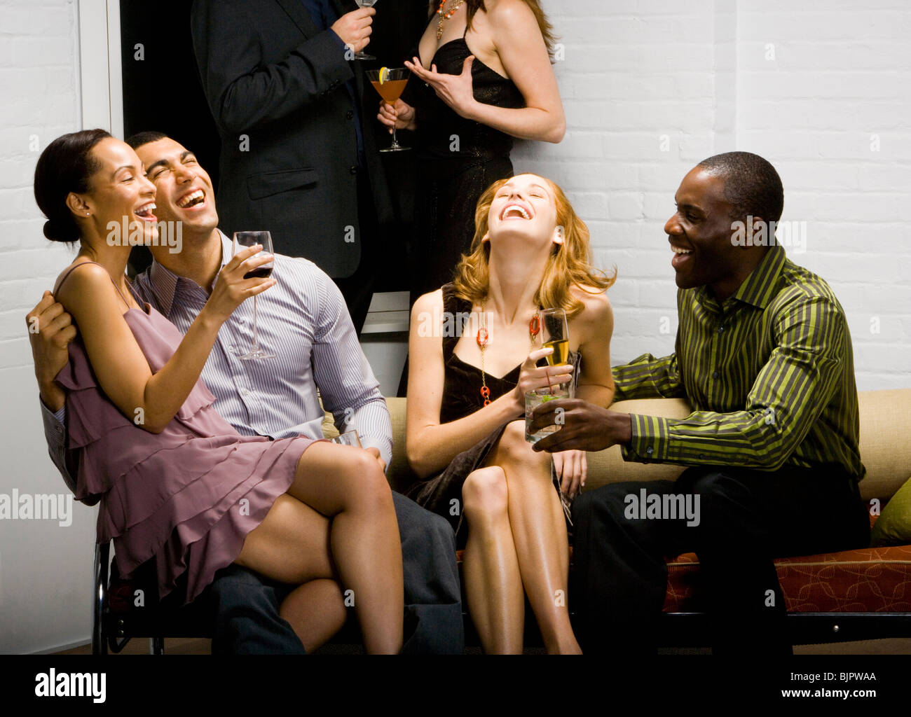 Couple drinks socializing laughing hi-res stock photography and images ...