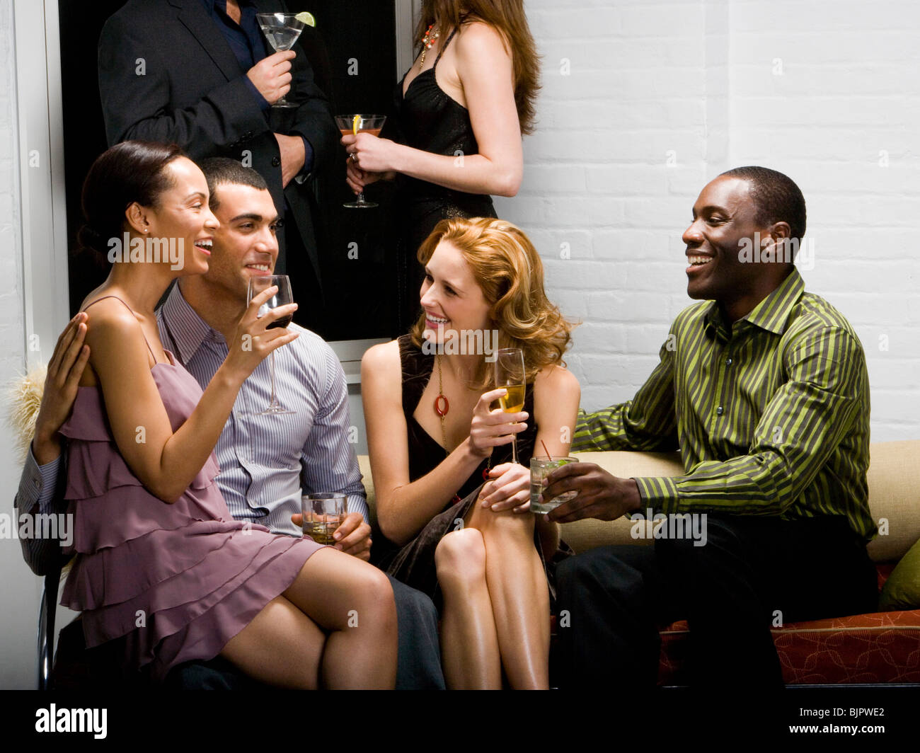 A couple at a party Stock Photo - Alamy