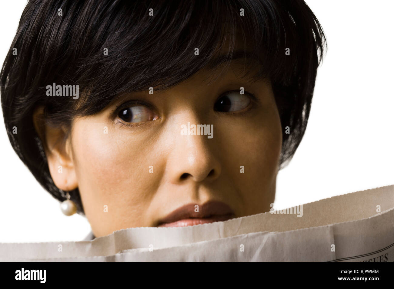 Woman reading the paper Stock Photo - Alamy