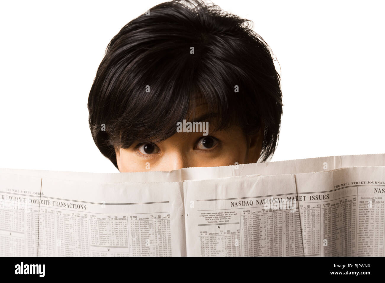Woman reading the paper Stock Photo - Alamy