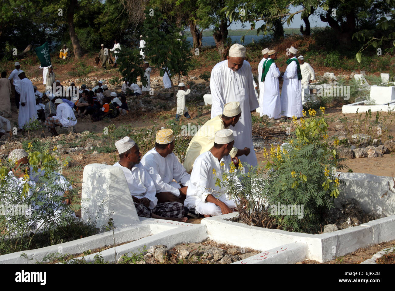 Pilgrims visit the Islamic cemetery to see the mausoleum of Sharif ...