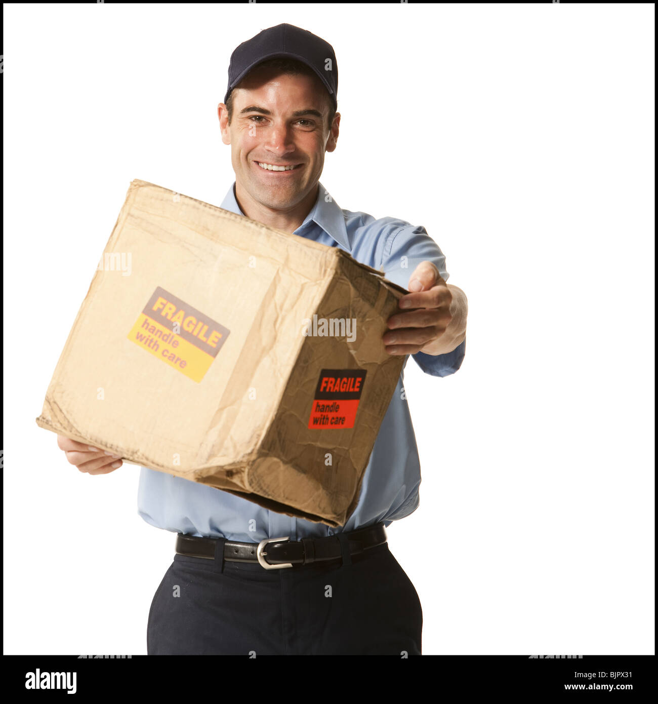Delivery man with damaged package Stock Photo - Alamy