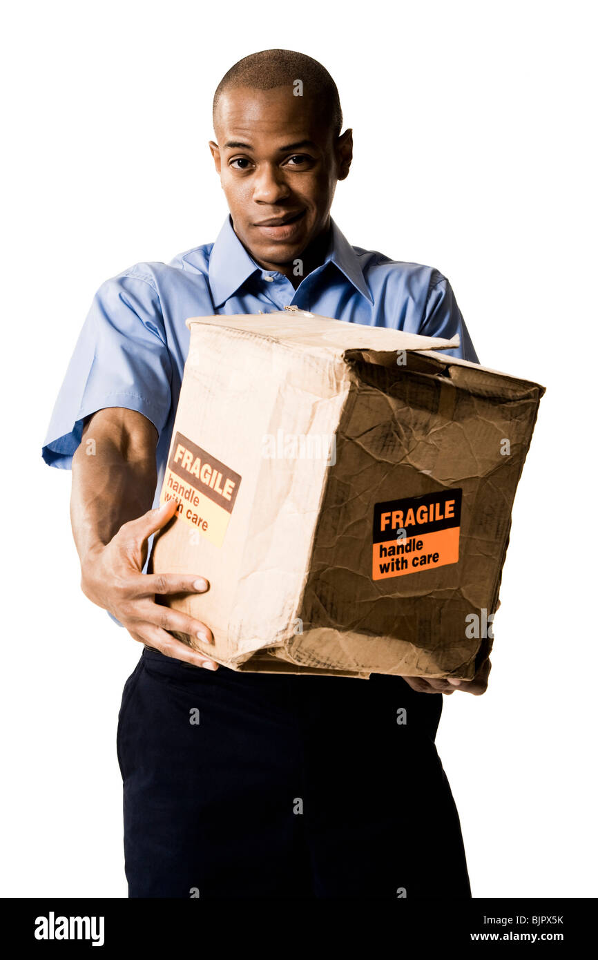Delivery man with damaged package Stock Photo - Alamy