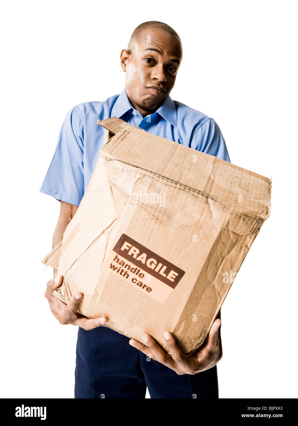 Delivery man with damaged package Stock Photo - Alamy
