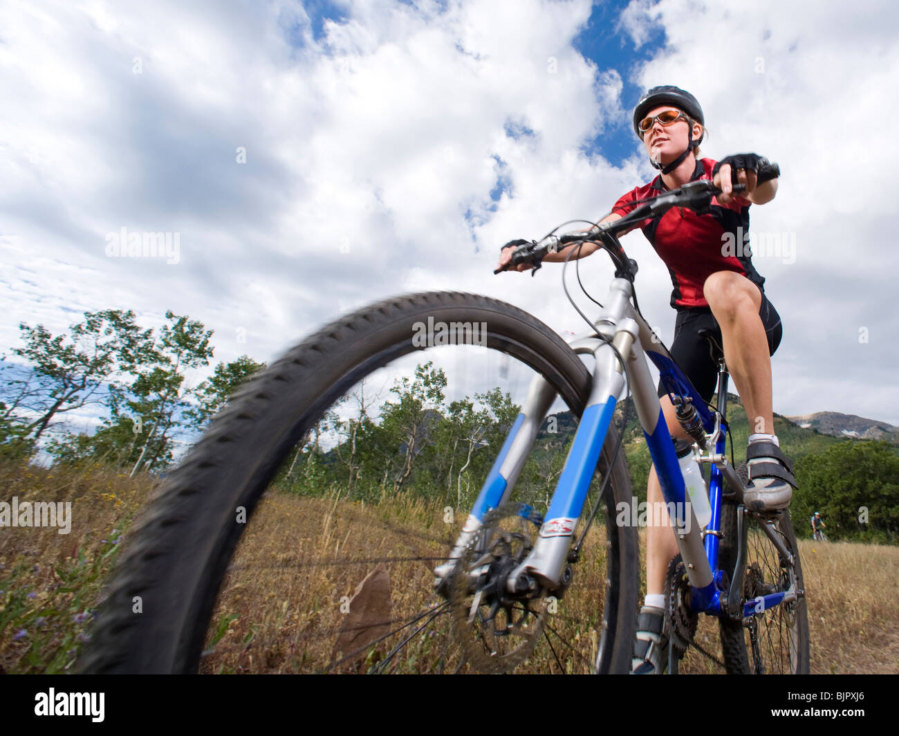 Cycling down path on sunny hi-res stock photography and images - Alamy