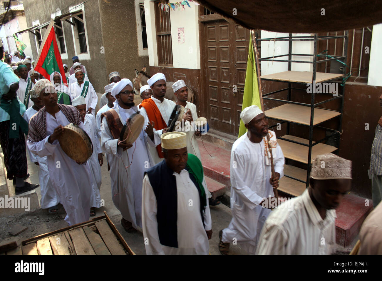 Celebrating Maulidi through the streets of Lamu Stock Photo - Alamy