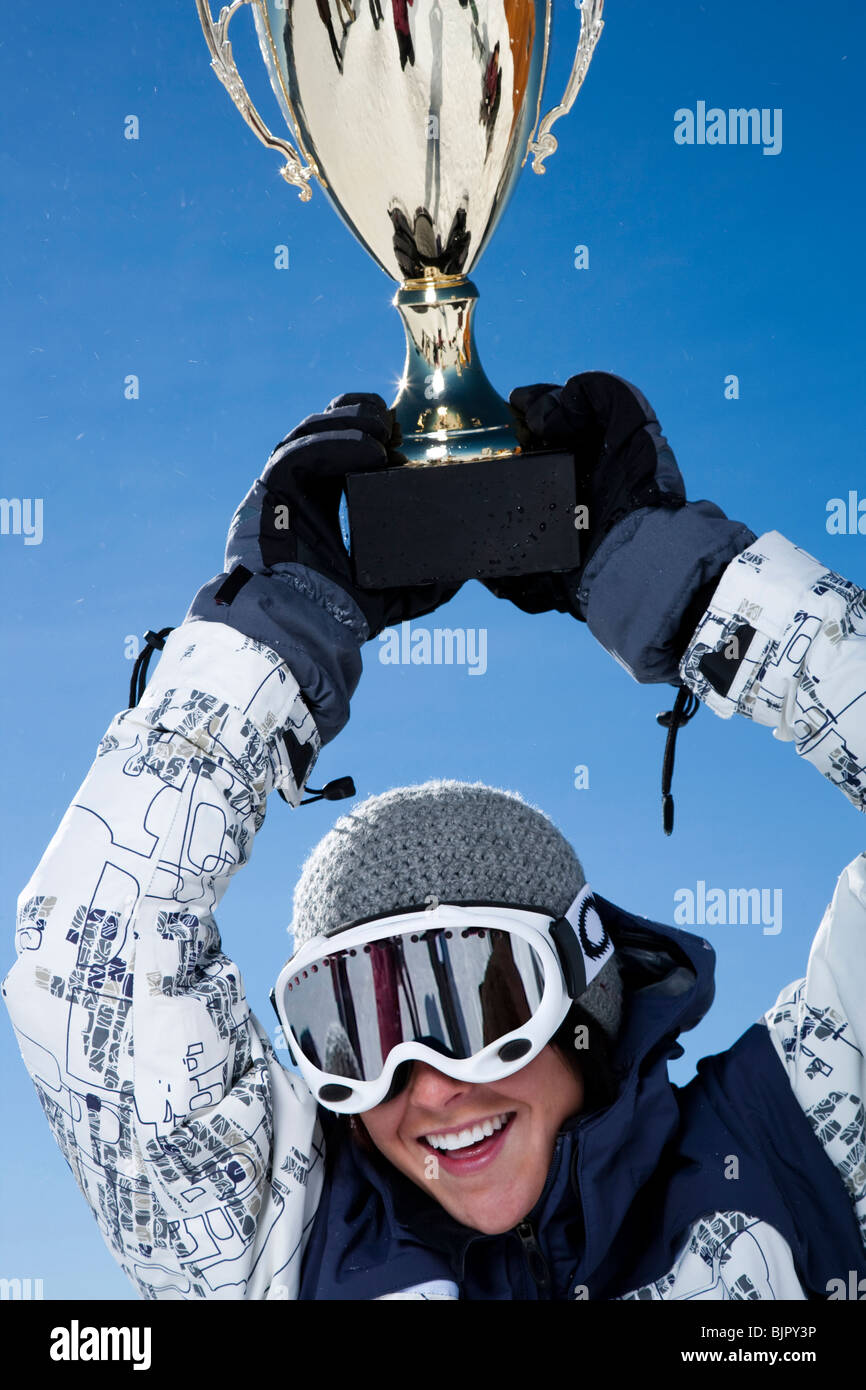 Woman holding a trophy Stock Photo - Alamy