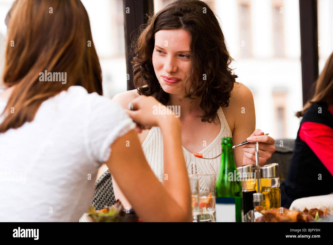 Women at a restaurant Stock Photo - Alamy