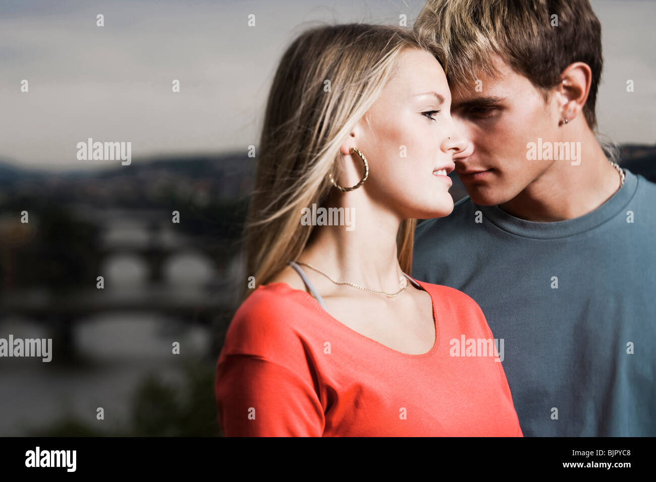Couple outside at night Stock Photo - Alamy