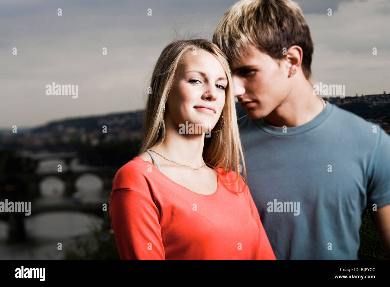 Couple outside at night Stock Photo - Alamy