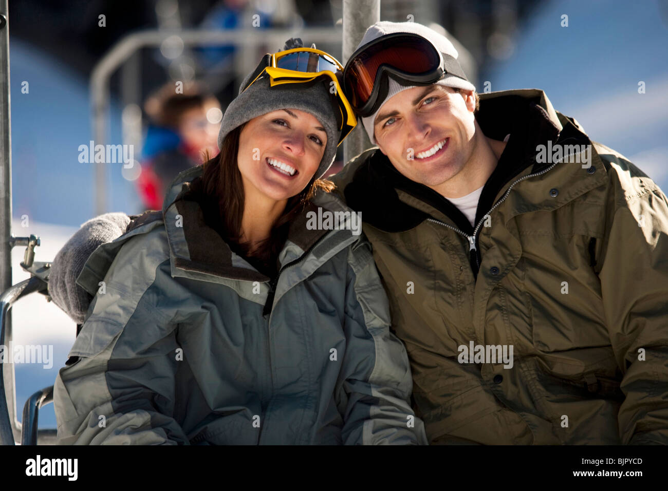 A couple on a chairlift Stock Photo - Alamy