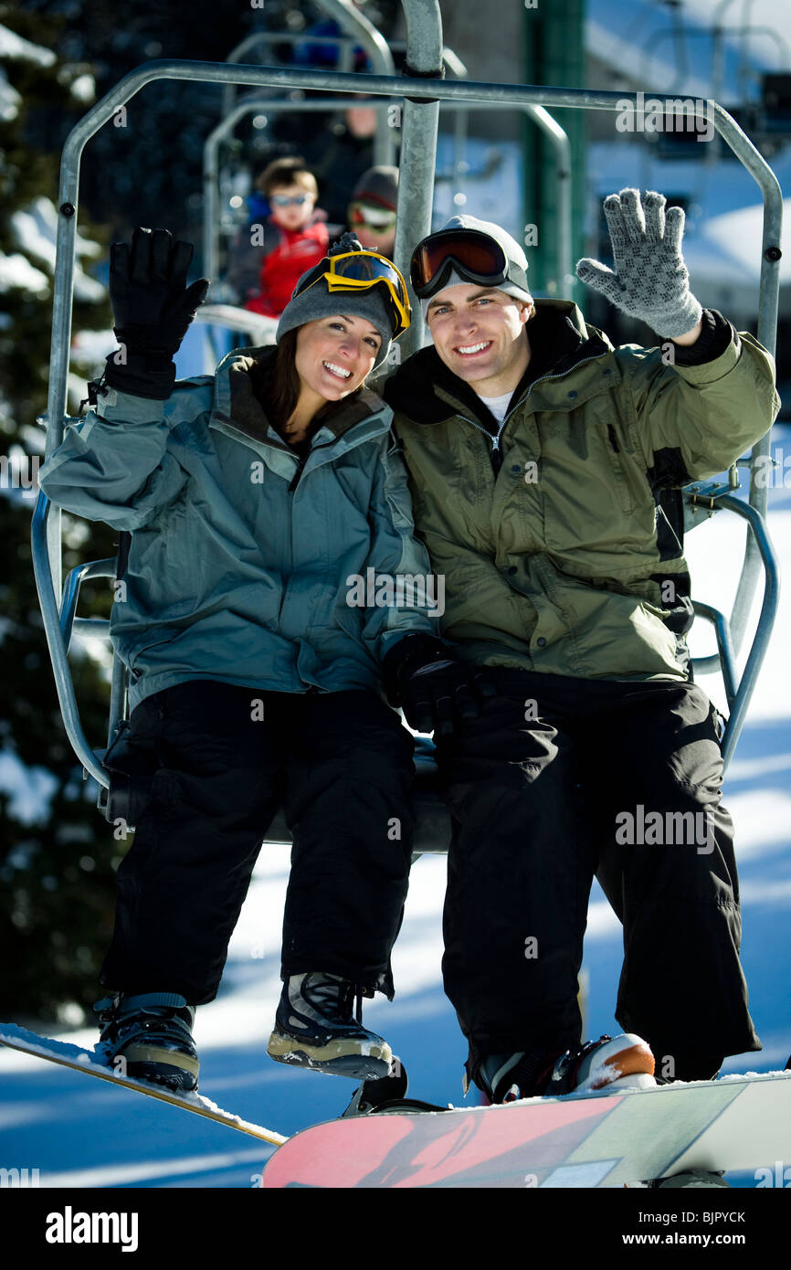 A couple on a chairlift Stock Photo - Alamy