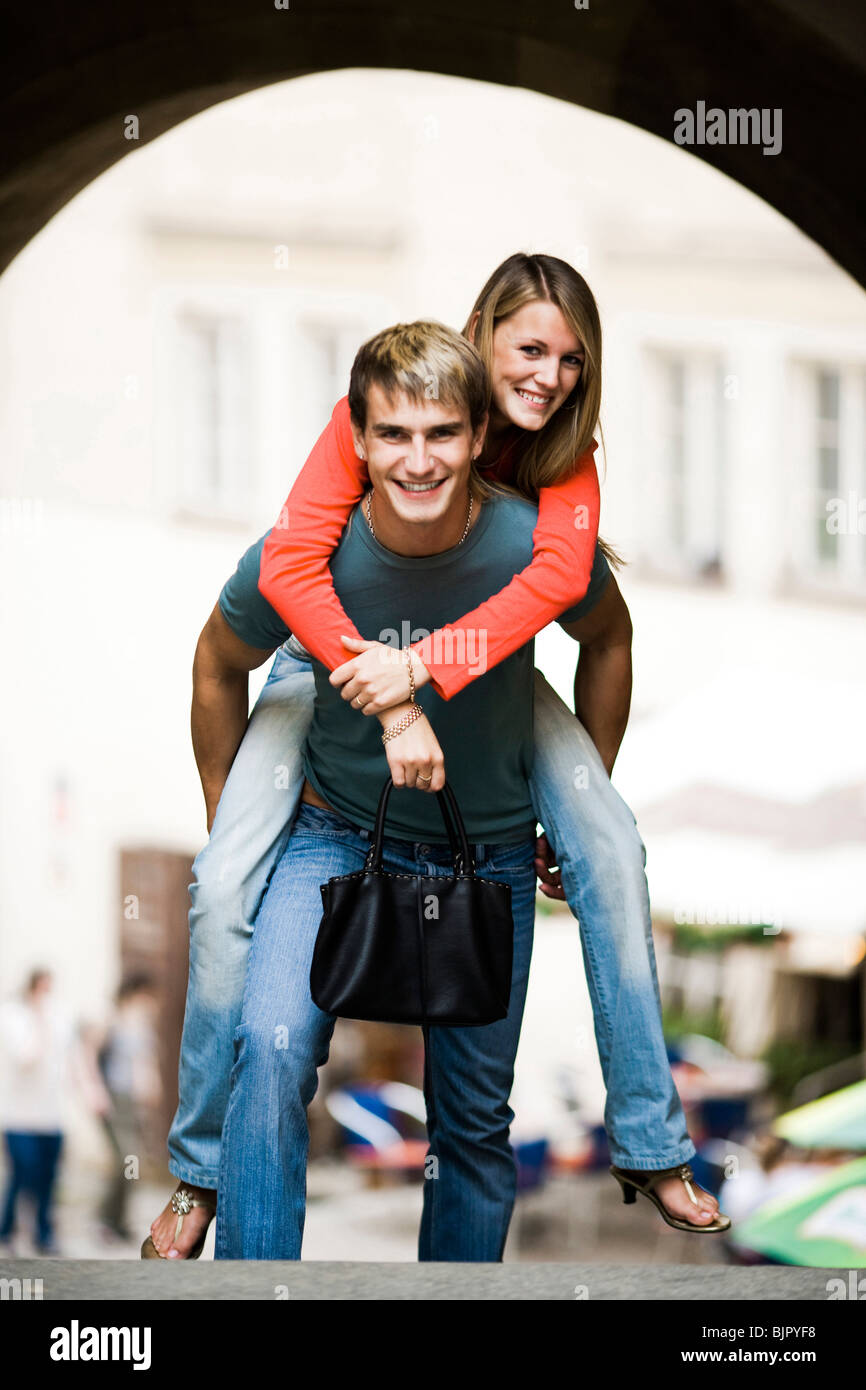 Man carrying woman Stock Photo - Alamy