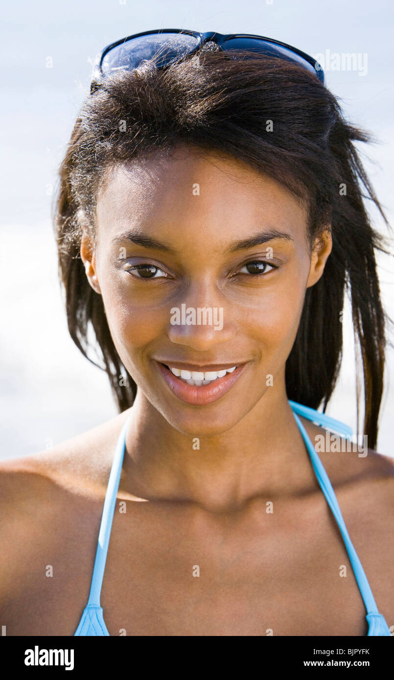 Head and shoulder shot of woman at the beach Stock Photo - Alamy