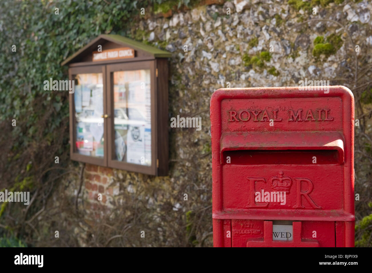 Royal Mail red letter box and village notice board in Turville ...