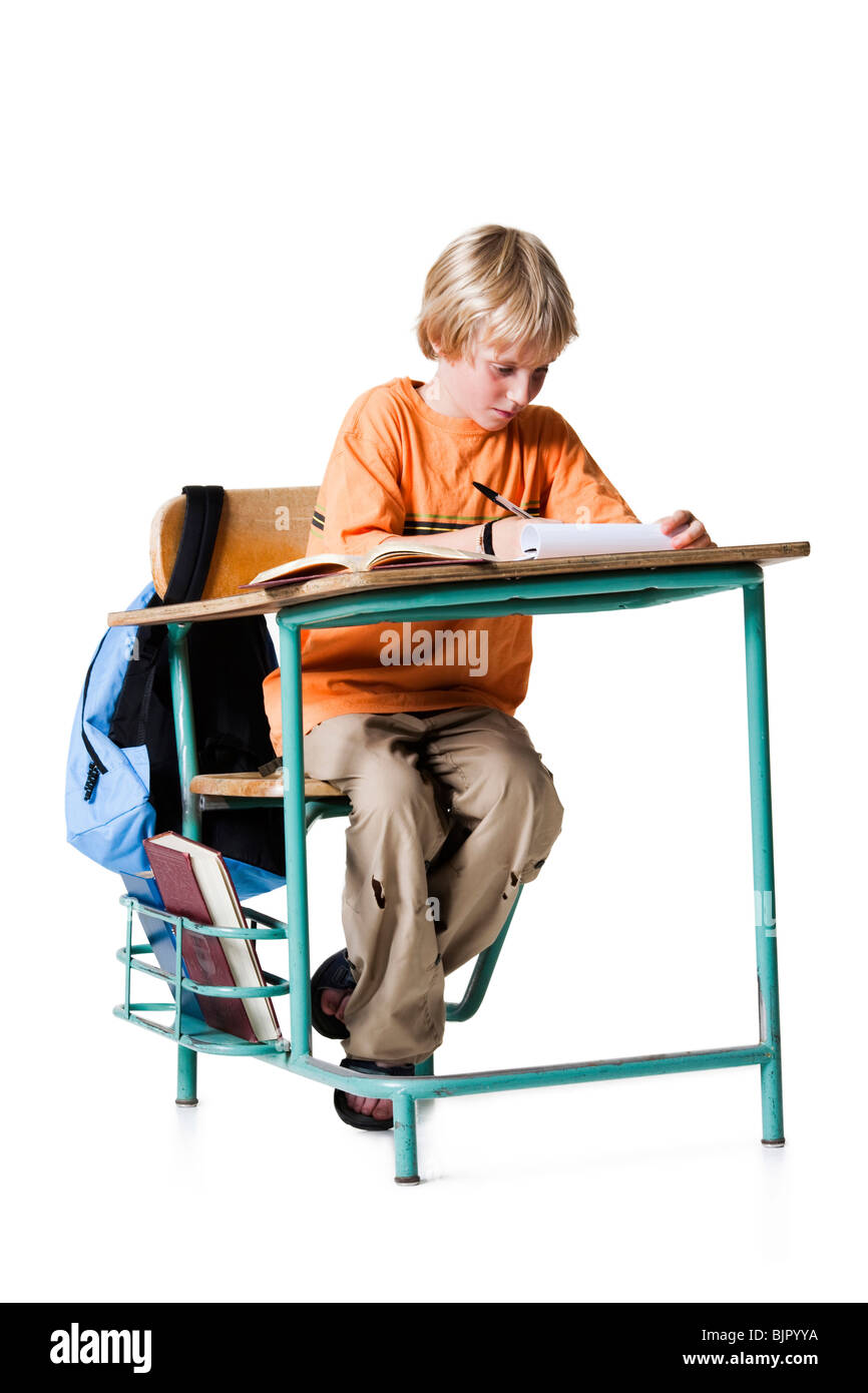 Boy doing his schoolwork Cut Out Stock Images & Pictures - Alamy