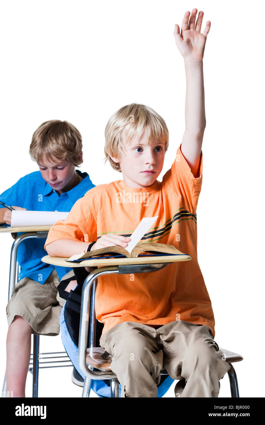 Boy doing school work Stock Photo - Alamy