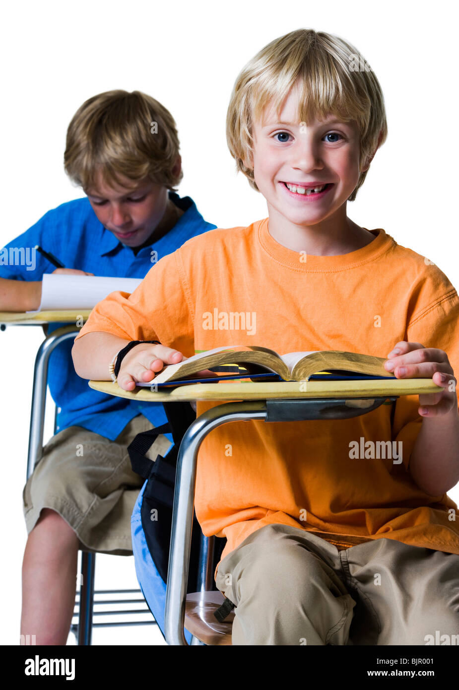 Boy doing school work Stock Photo - Alamy