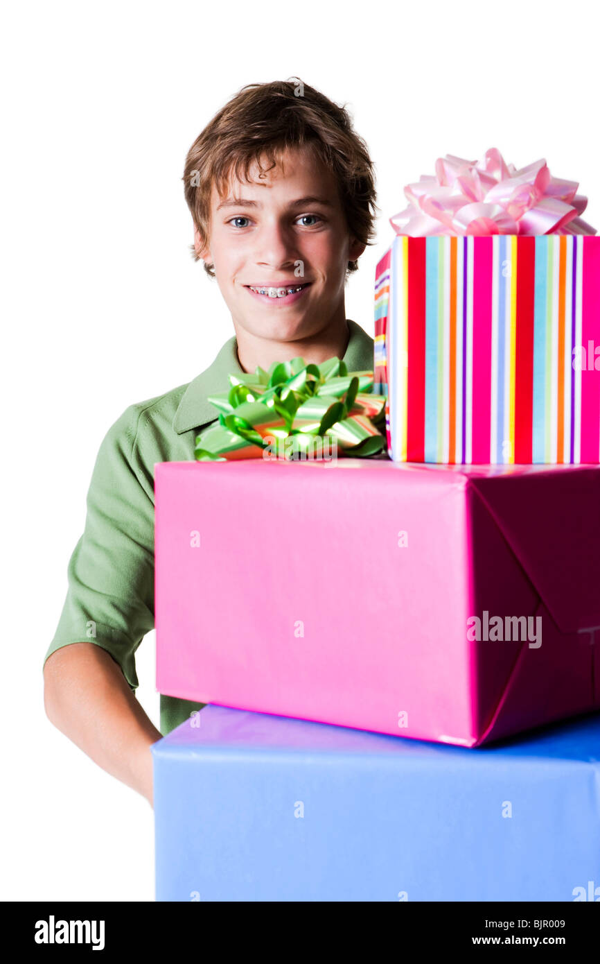 Boy carrying presents Stock Photo - Alamy