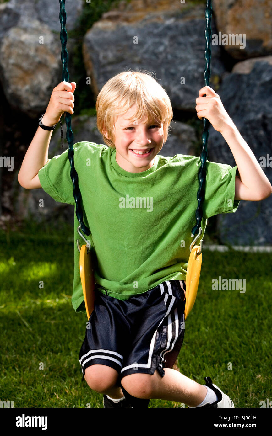 One boy child only swings caucasian hi-res stock photography and images ...