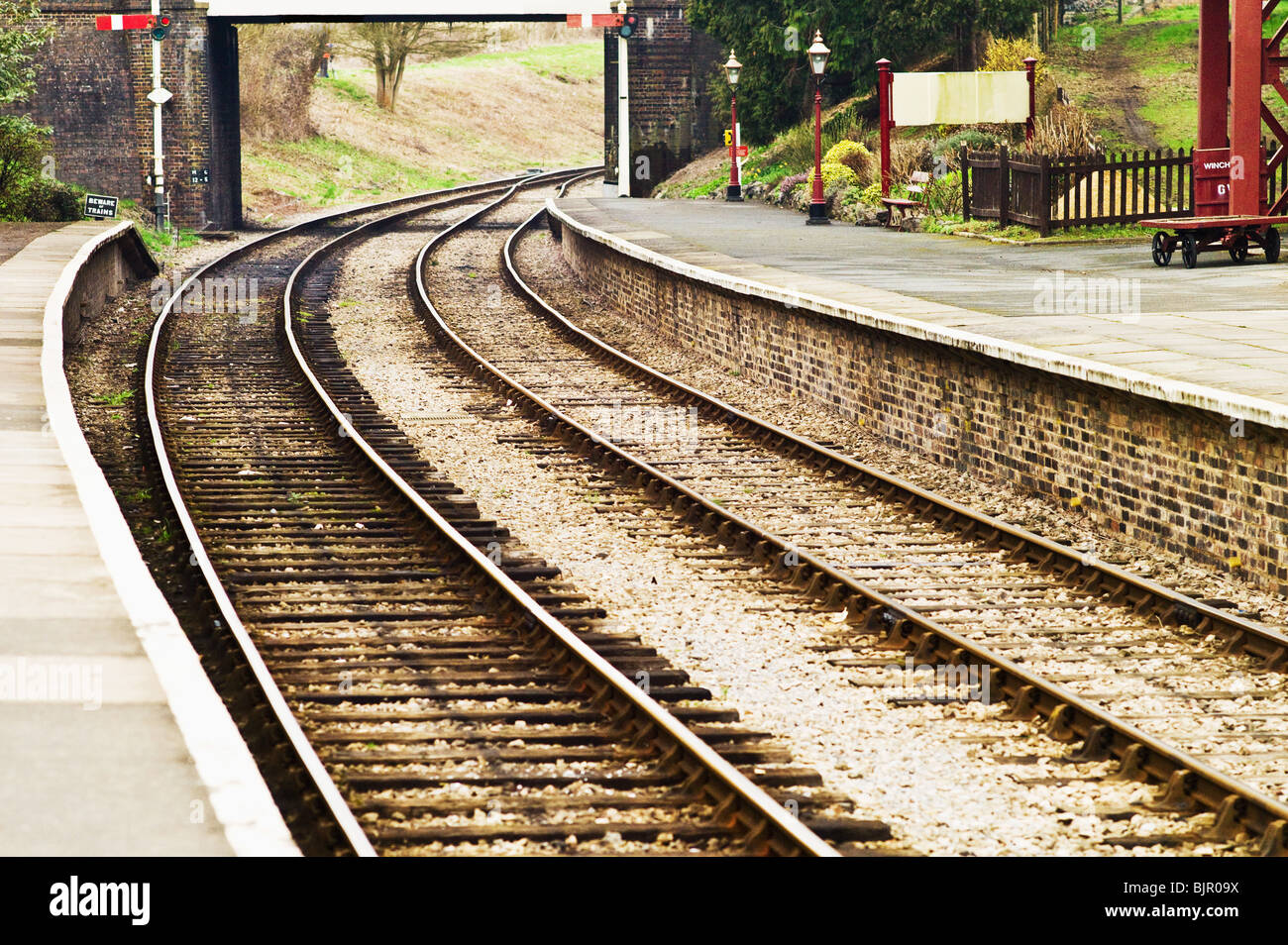 A station on a railway line in the countryside Stock Photo - Alamy
